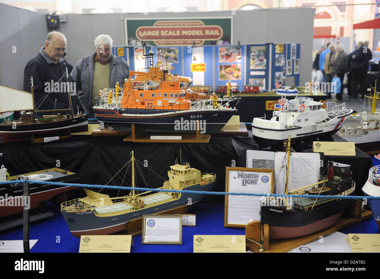 Alexandra Palace, London, UK. 18th January 2013. Two men look at a ...