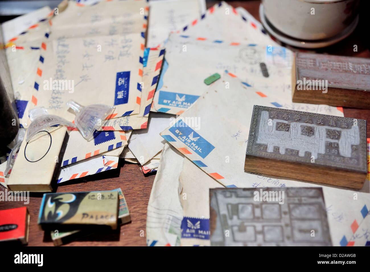 Old envelope on wooden desk Stock Photo - Alamy