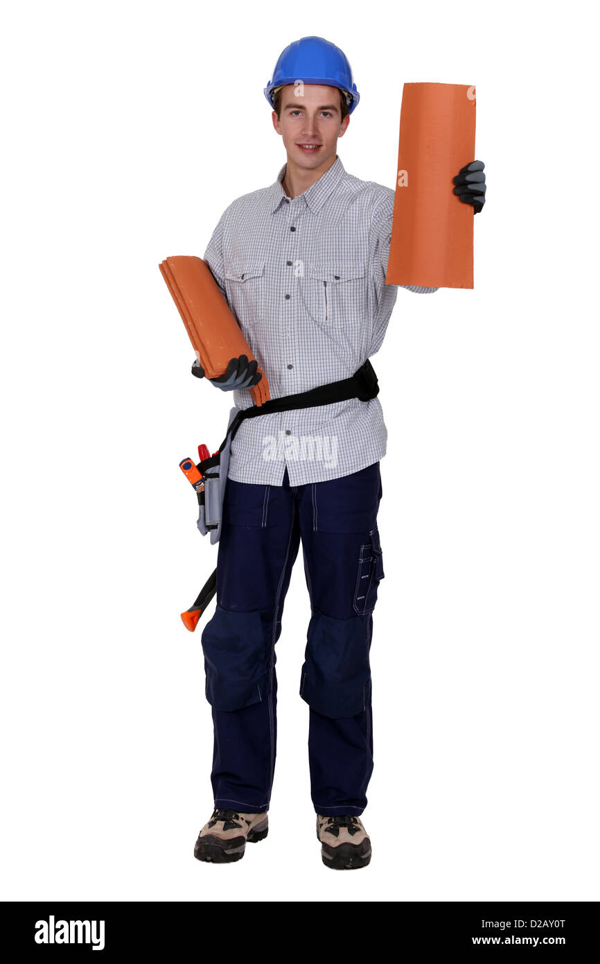 Craftsman with tiles Stock Photo - Alamy