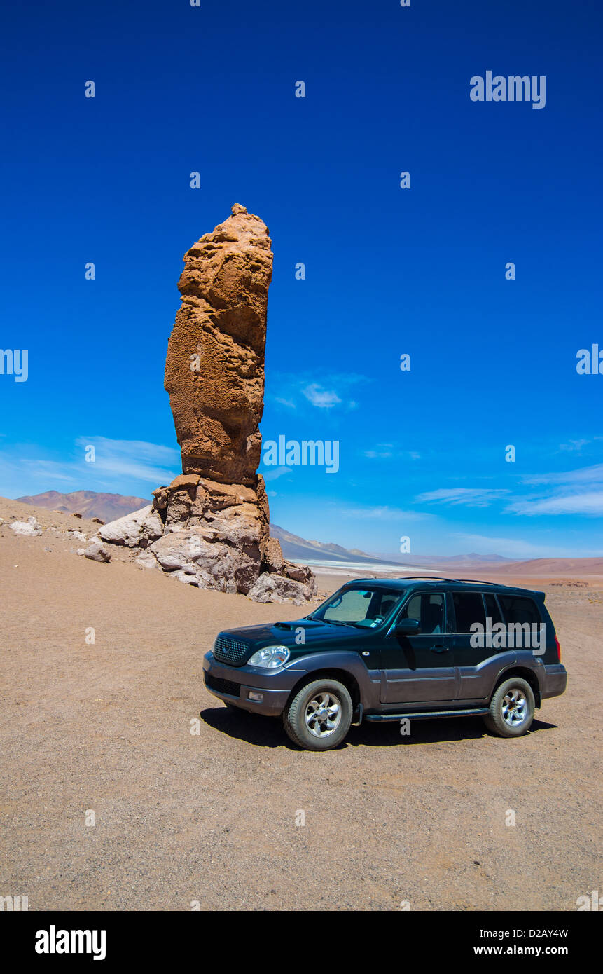Rock Formations in Salar de Tara with 4WD Truck, Chile Stock Photo - Alamy
