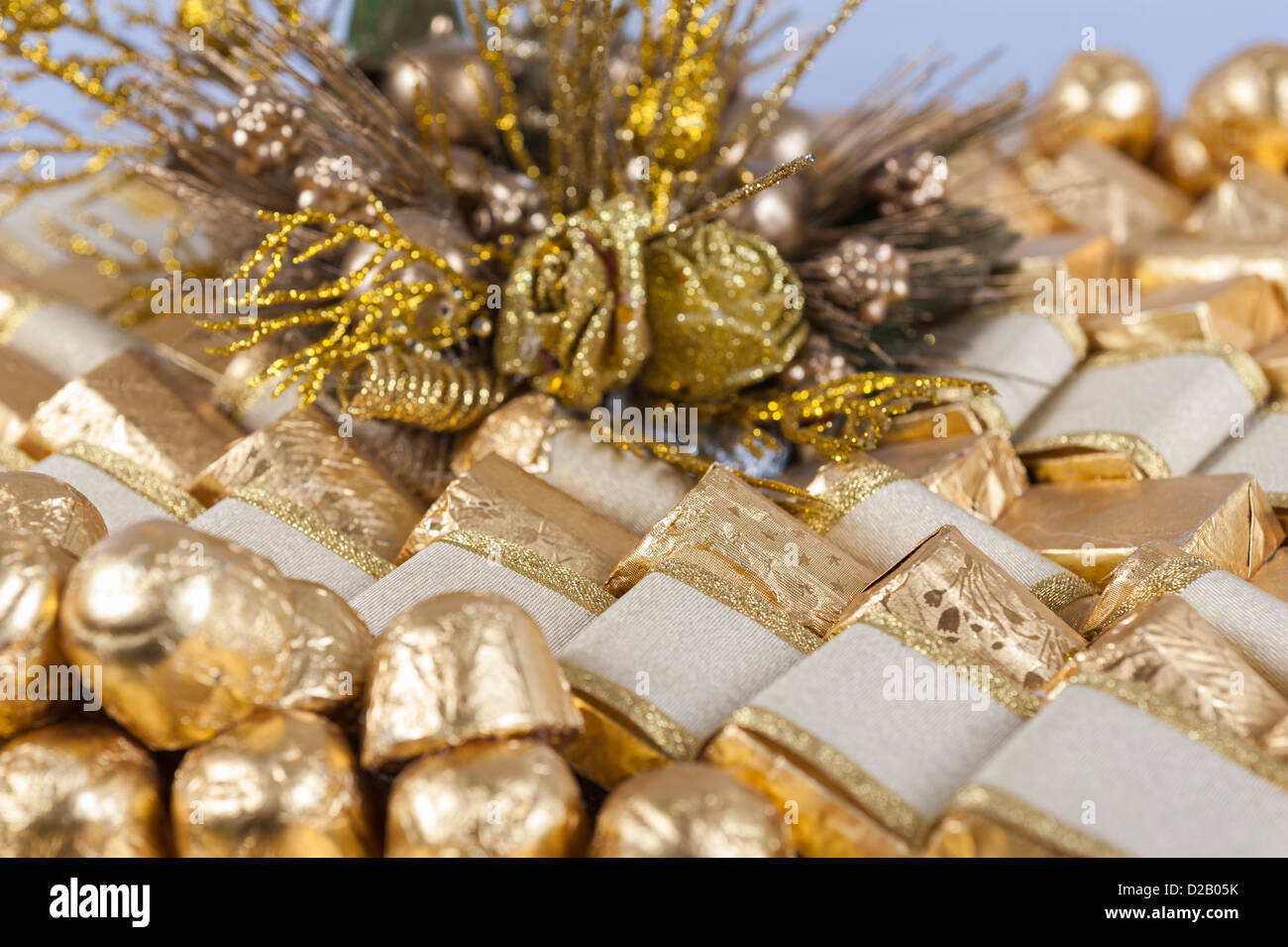 Display showing collection of festive style chocolate sweets with ...