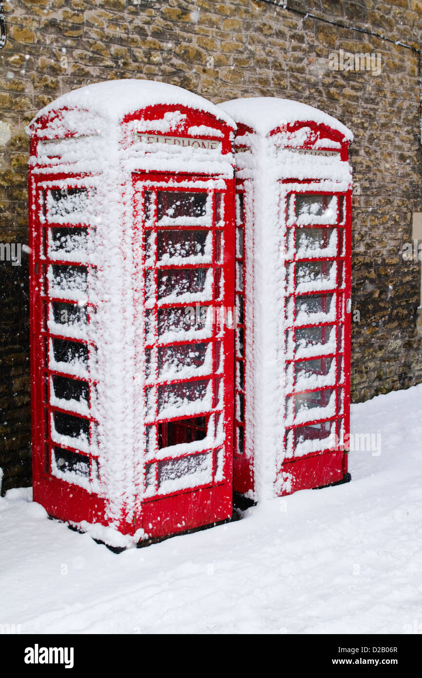 Wintry blizzard covers the telephone boxes in snow Stock Photo - Alamy
