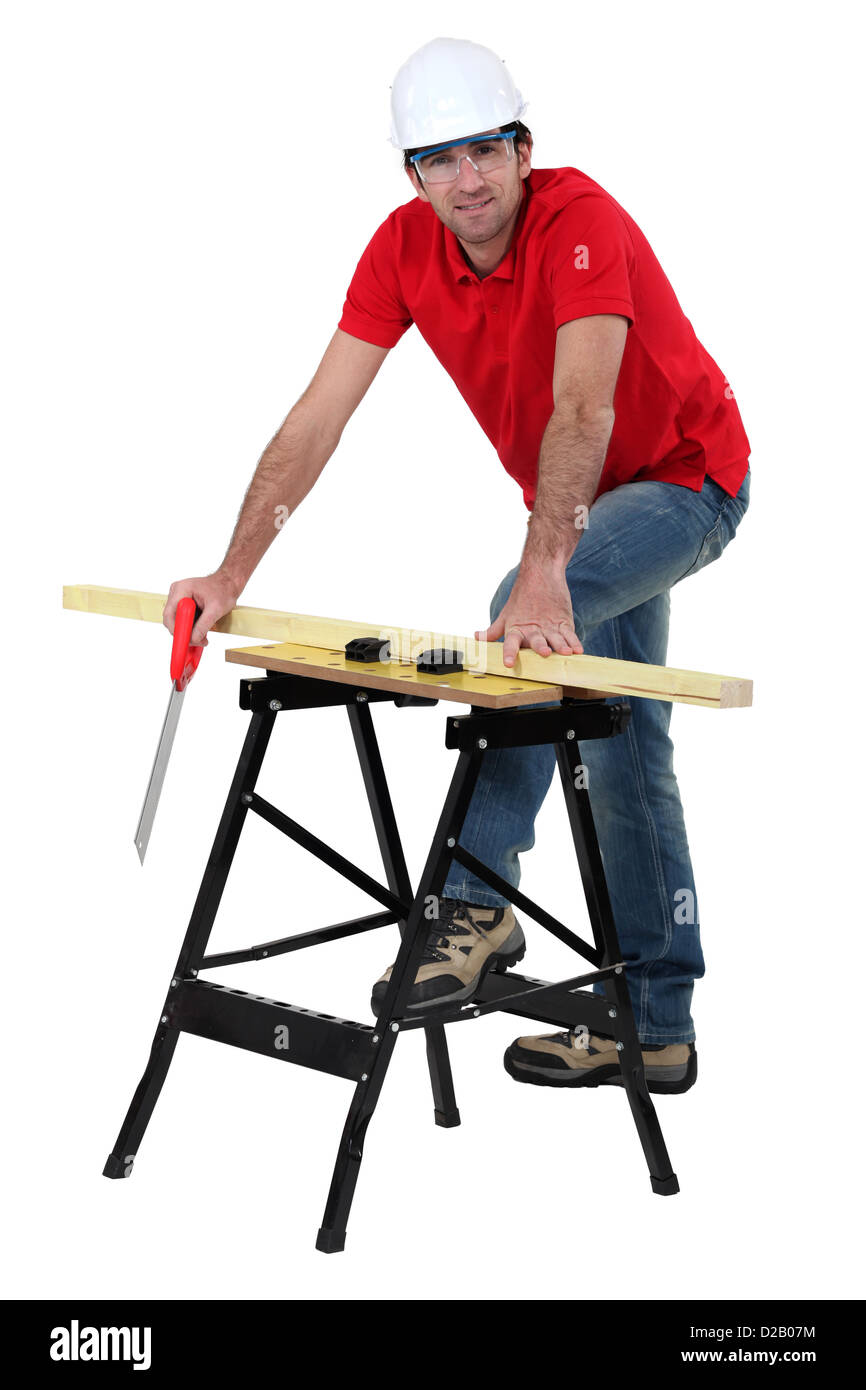 craftsman cutting wood Stock Photo - Alamy