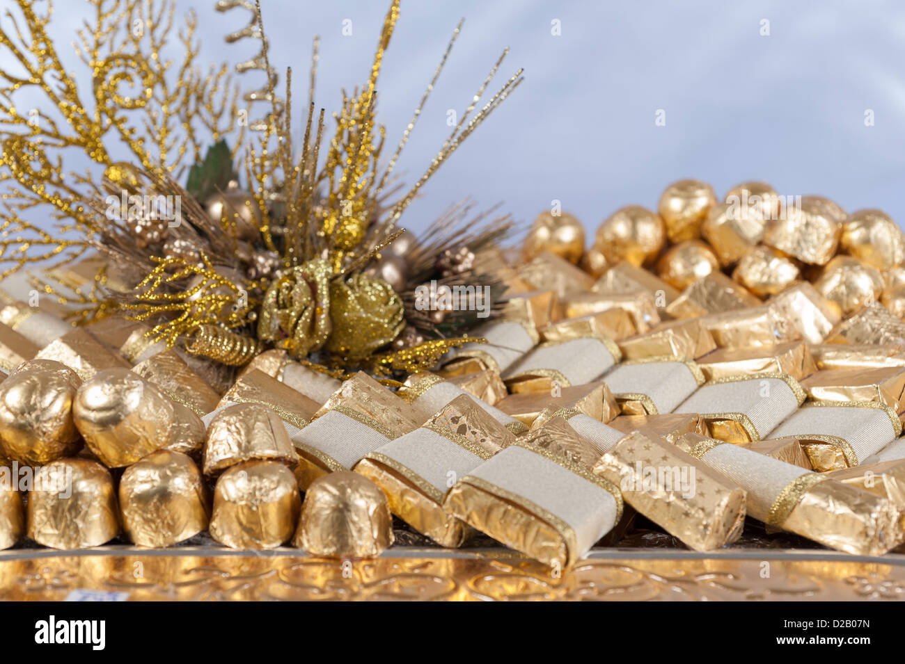Display showing collection of festive style chocolate sweets with ...