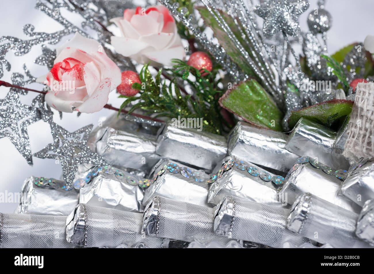 Display showing collection of festive style chocolate sweets with ...