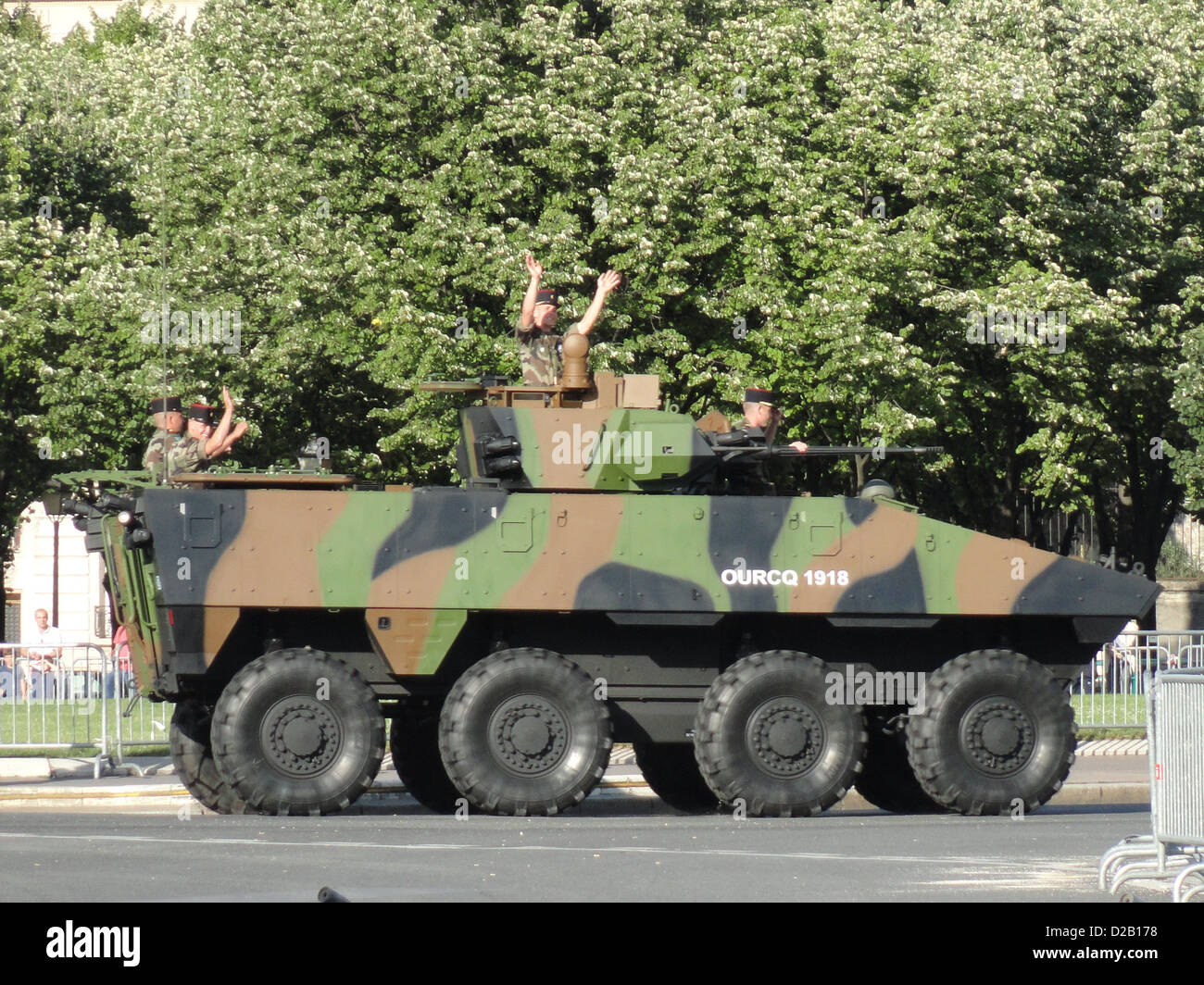 An armored vehicle with infantry combat units participating in a ...