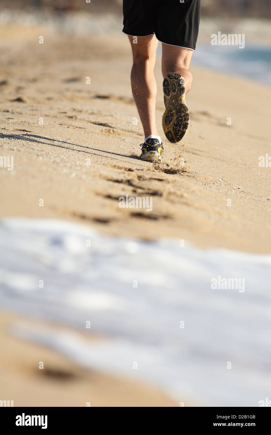 Runner footprint on beach runner hi-res stock photography and images ...