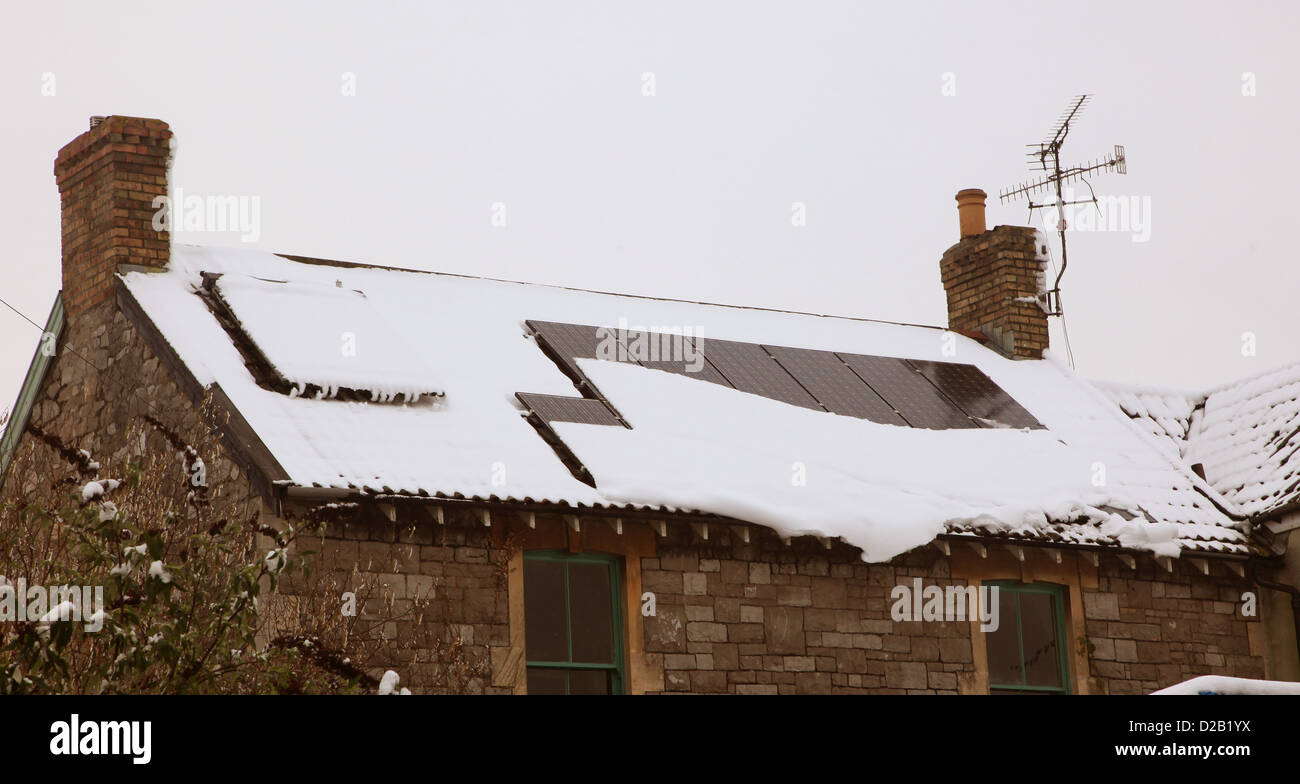 Snow sliding off solar panels during the winter of January 2013 in the ...