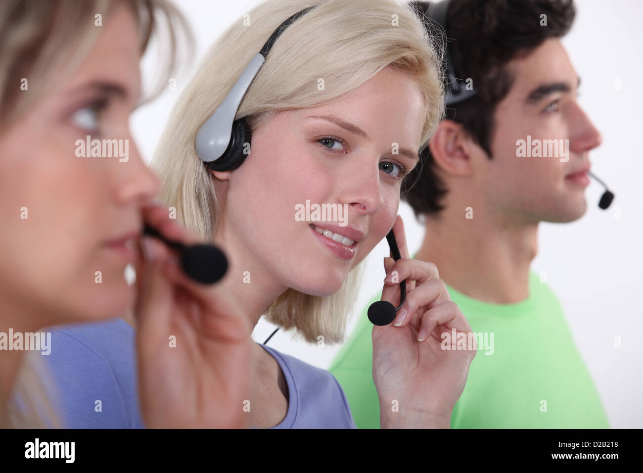 Three call-center workers Stock Photo - Alamy