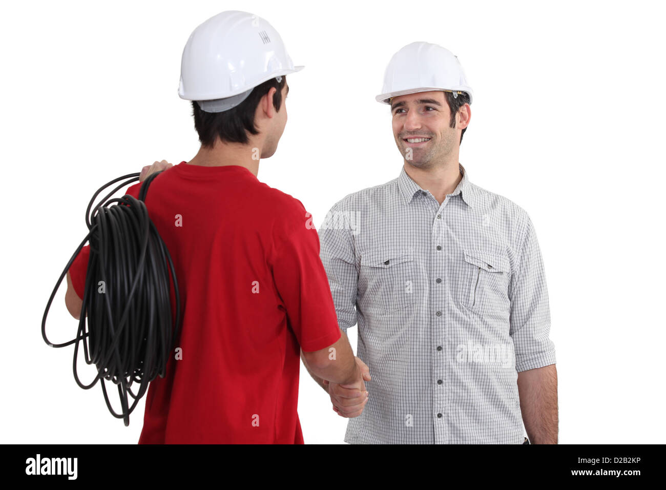 electricians shaking hands Stock Photo - Alamy