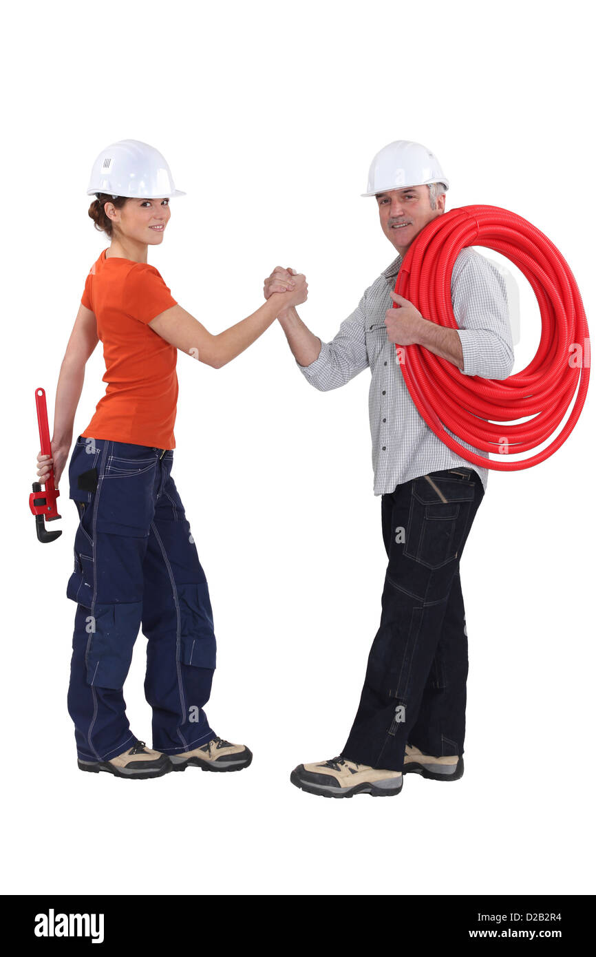 Friendly construction workers Stock Photo - Alamy