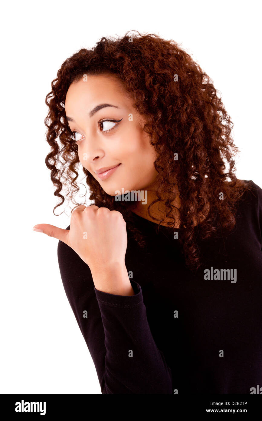 Young woman pointing at the side Stock Photo - Alamy