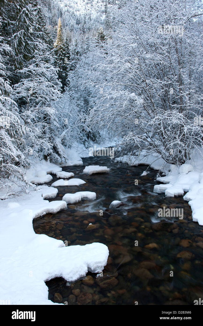 Snowy mountain stream Stock Photo - Alamy