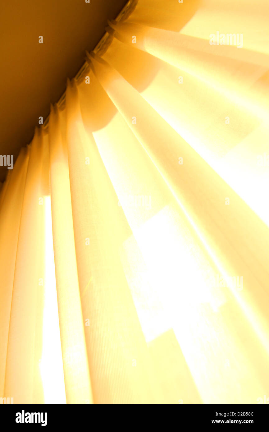 Sunlight falling through a semi transparent curtain Stock Photo - Alamy