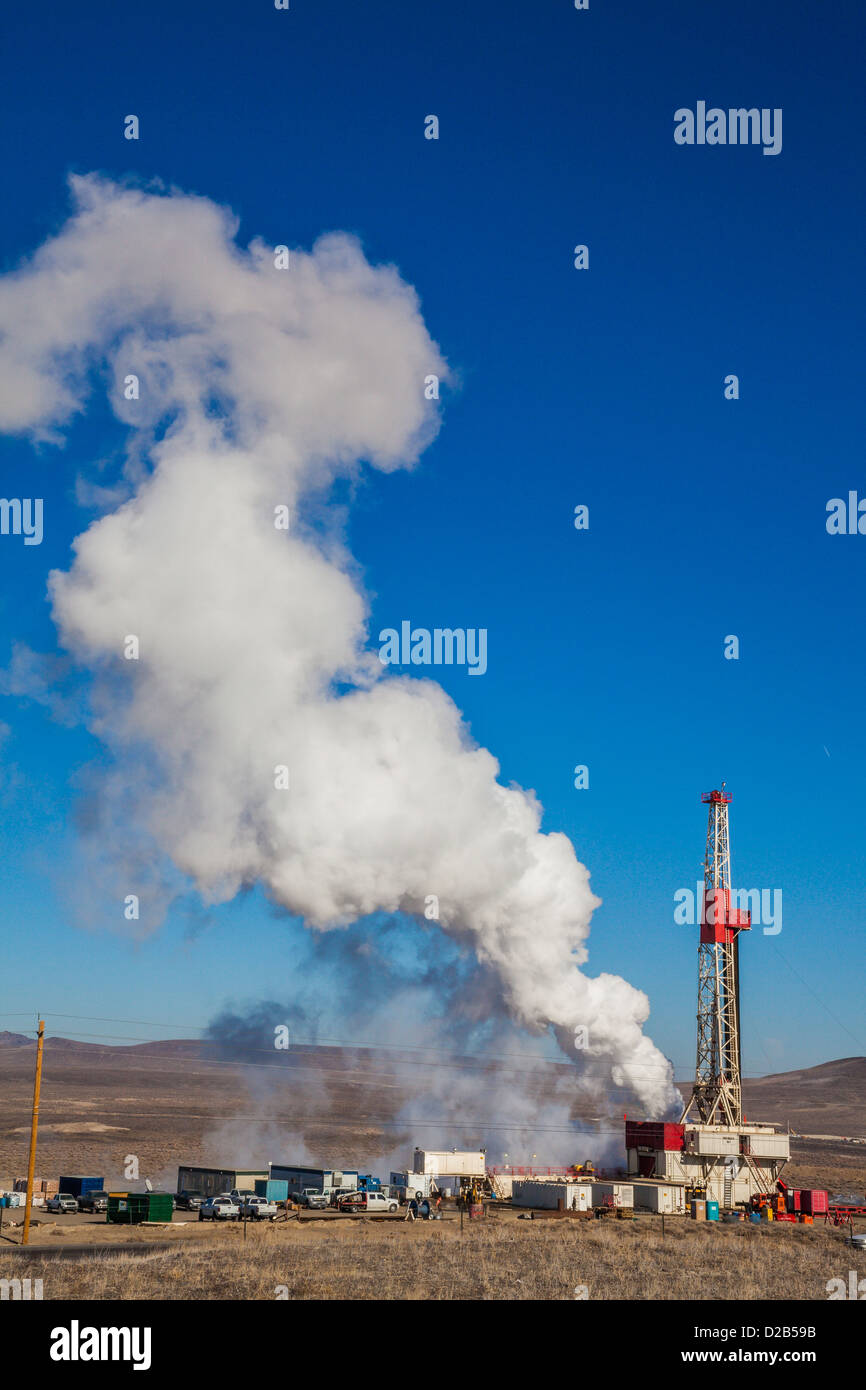 A drilling rig with a steam plume in the High Desert town of Fernley ...