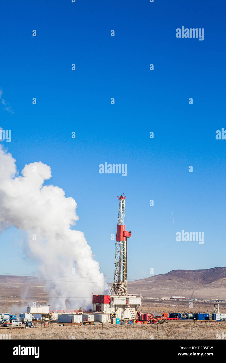 A drilling rig with a steam plume in the High Desert town of Fernley ...