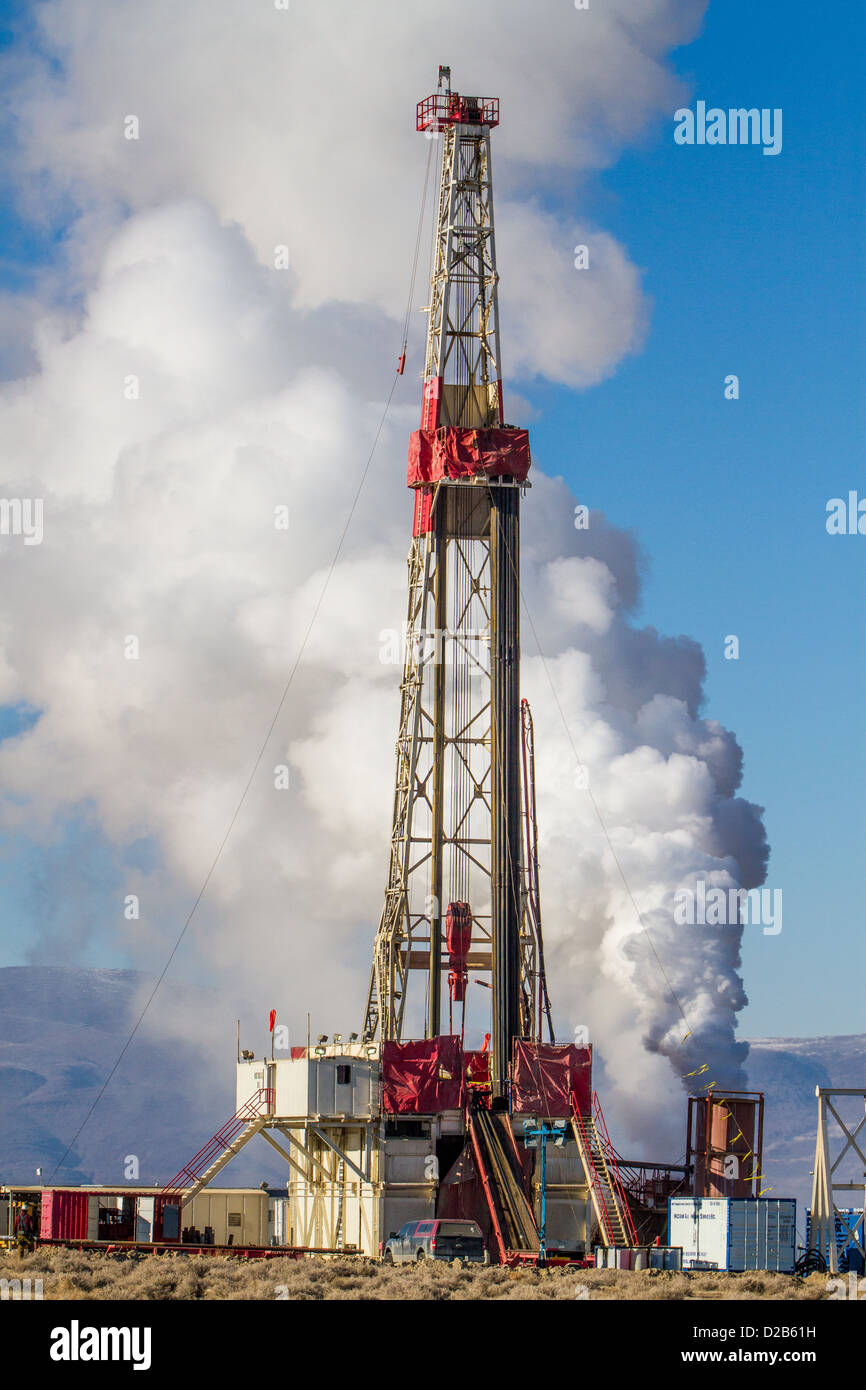 A drilling rig with a steam plume in the High Desert town of Fernley ...