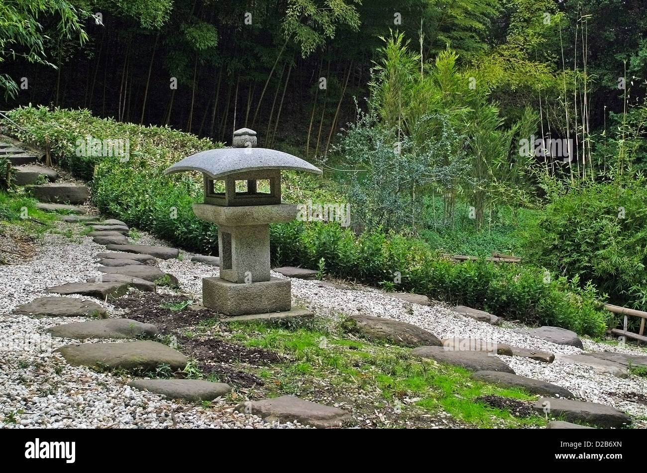 A Japanese garden lantern and a stone path Stock Photo - Alamy
