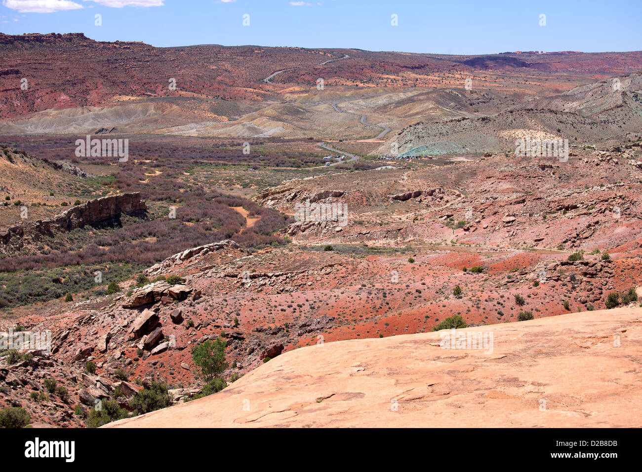 Erosional landscape with red mountains and the road in Utah, USA Stock ...