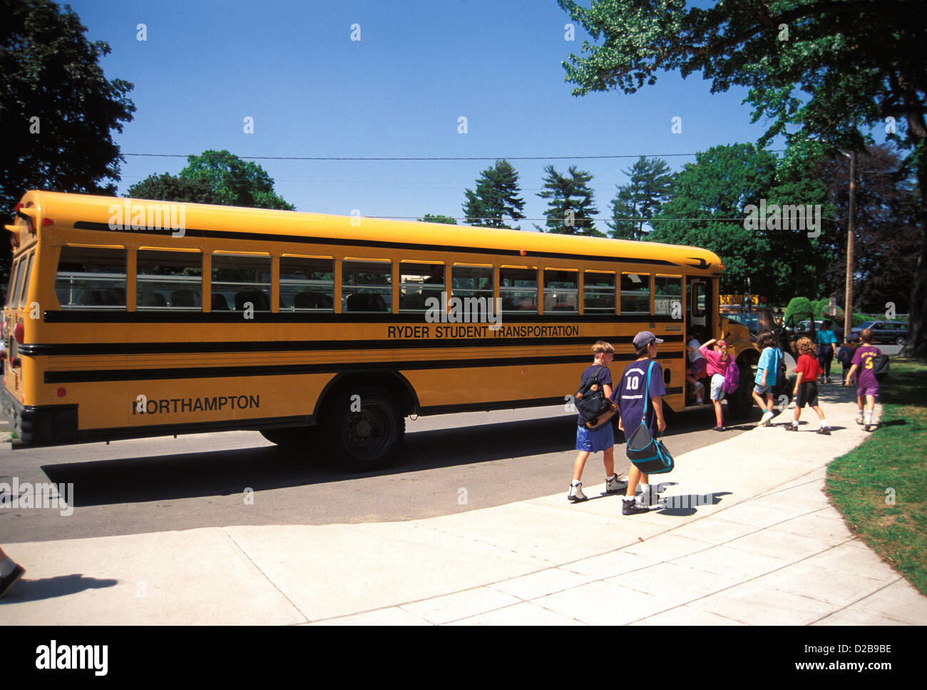 Students boarding bus hi-res stock photography and images - Alamy
