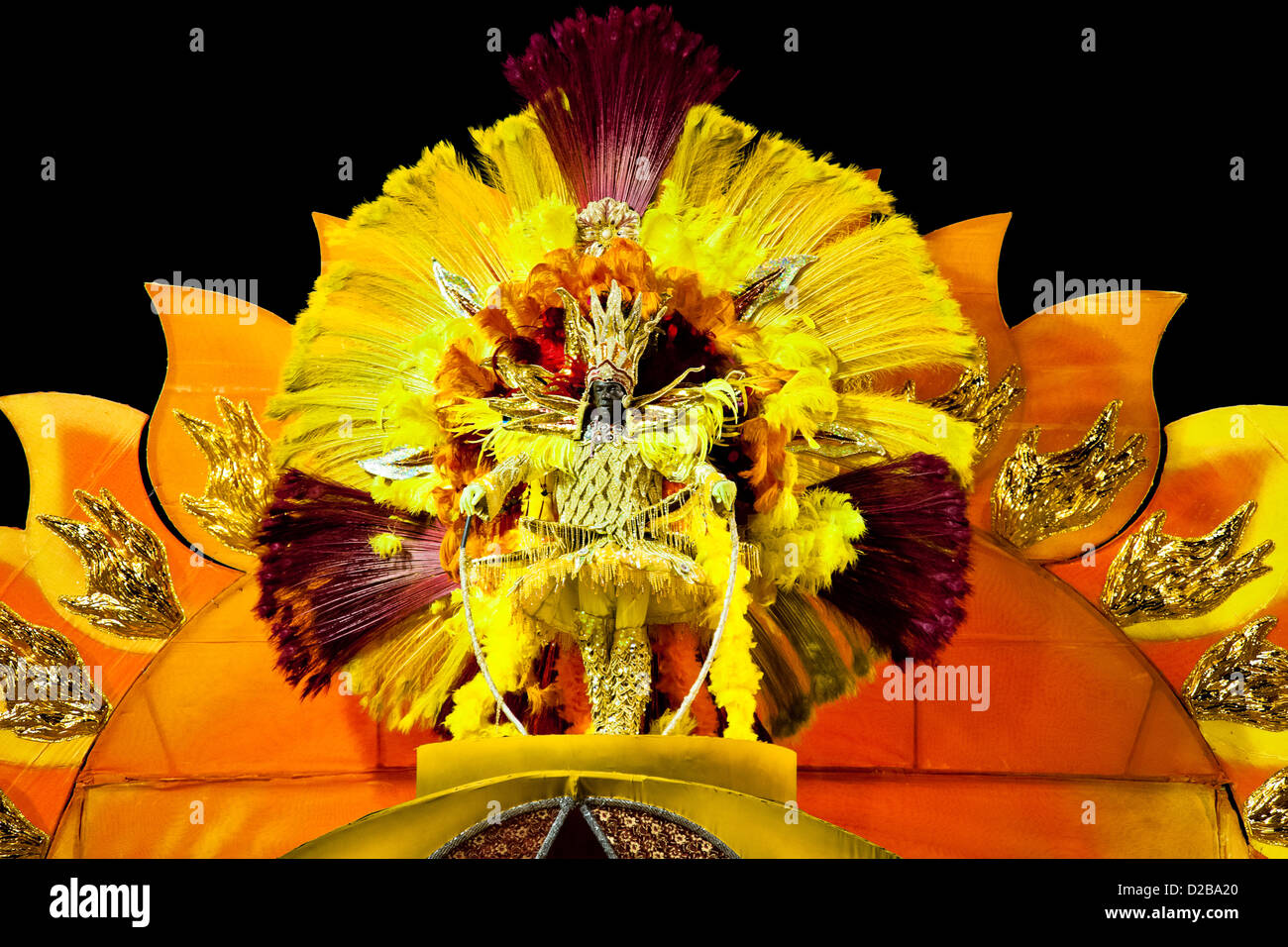 A samba school dancer performs atop a float during the Carnival Access ...