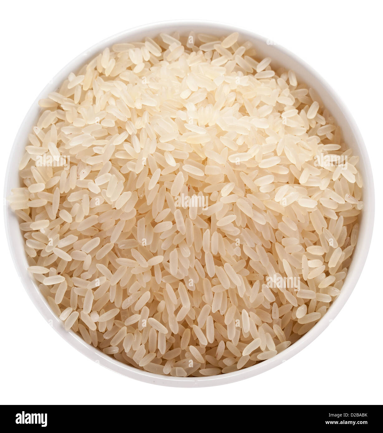 Uncooked rice in a bowl on a white background. Clipping path Stock ...