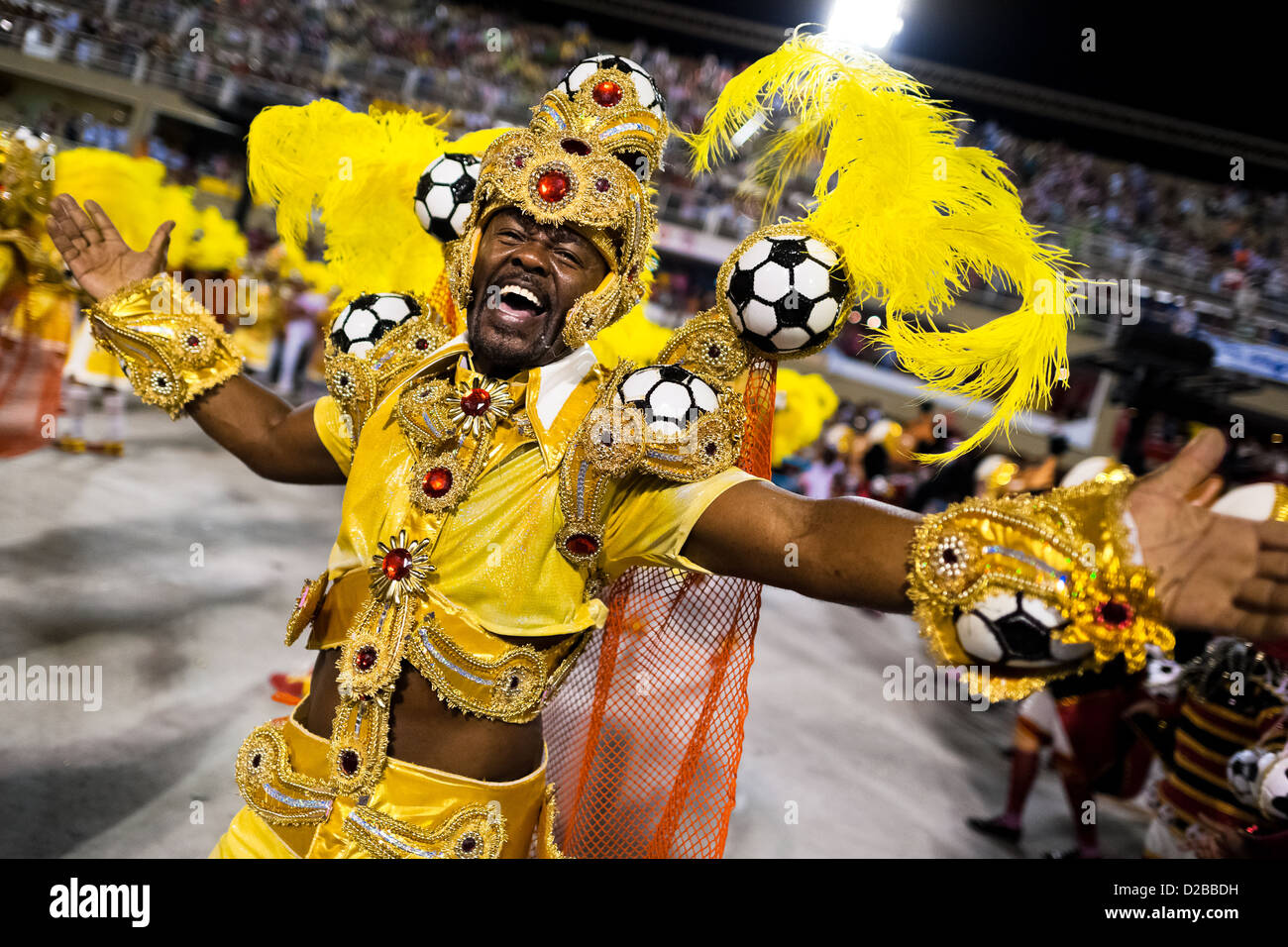 Samba school dancers perform during the Carnival Access Group parade at ...