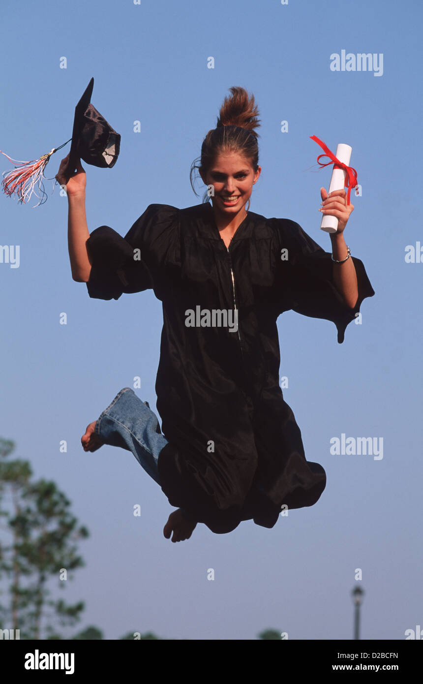 High School Graduate Jumping For Joy Stock Photo - Alamy