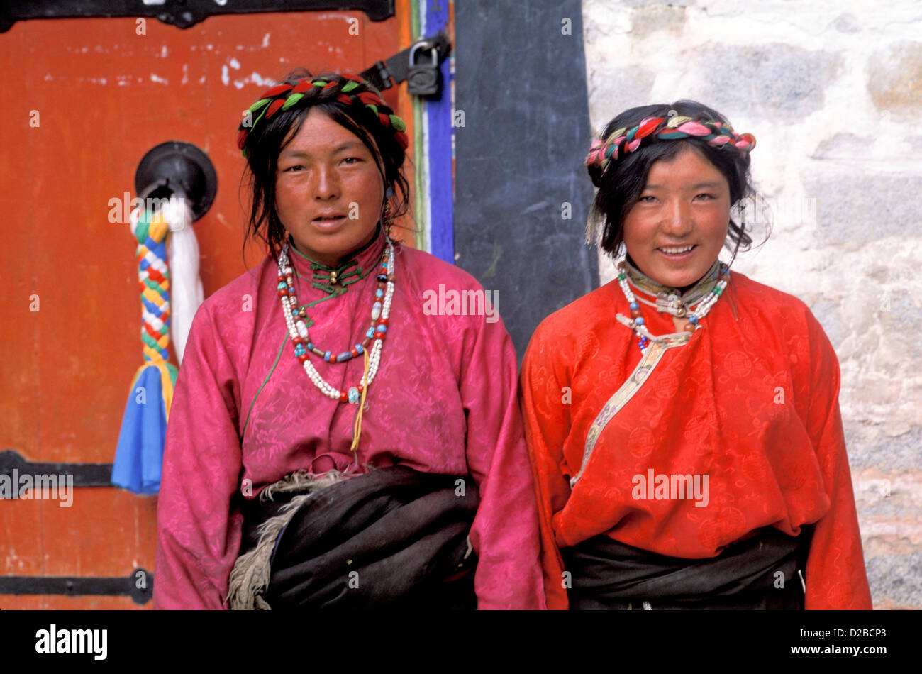 Tibet, Lhasa. Summer Palace. Two Women In Traditional Dress Stock Photo ...