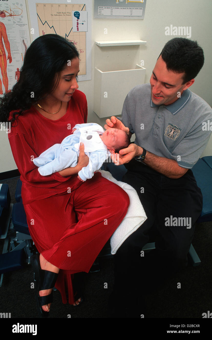 Chiropractor Adjusting One Week Old Baby Stock Photo - Alamy