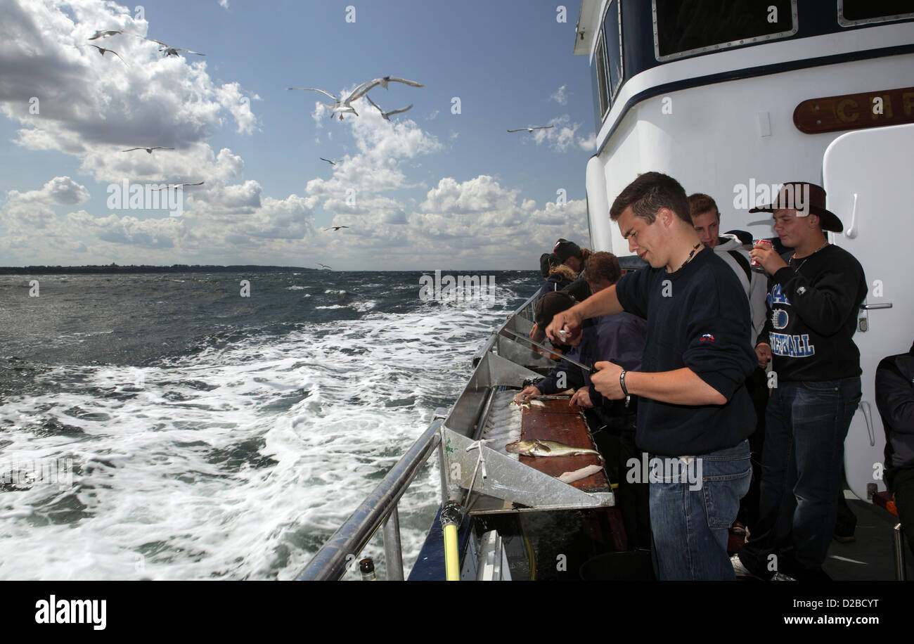 Wismar, Germany, Men at Sea Fishing Stock Photo - Alamy
