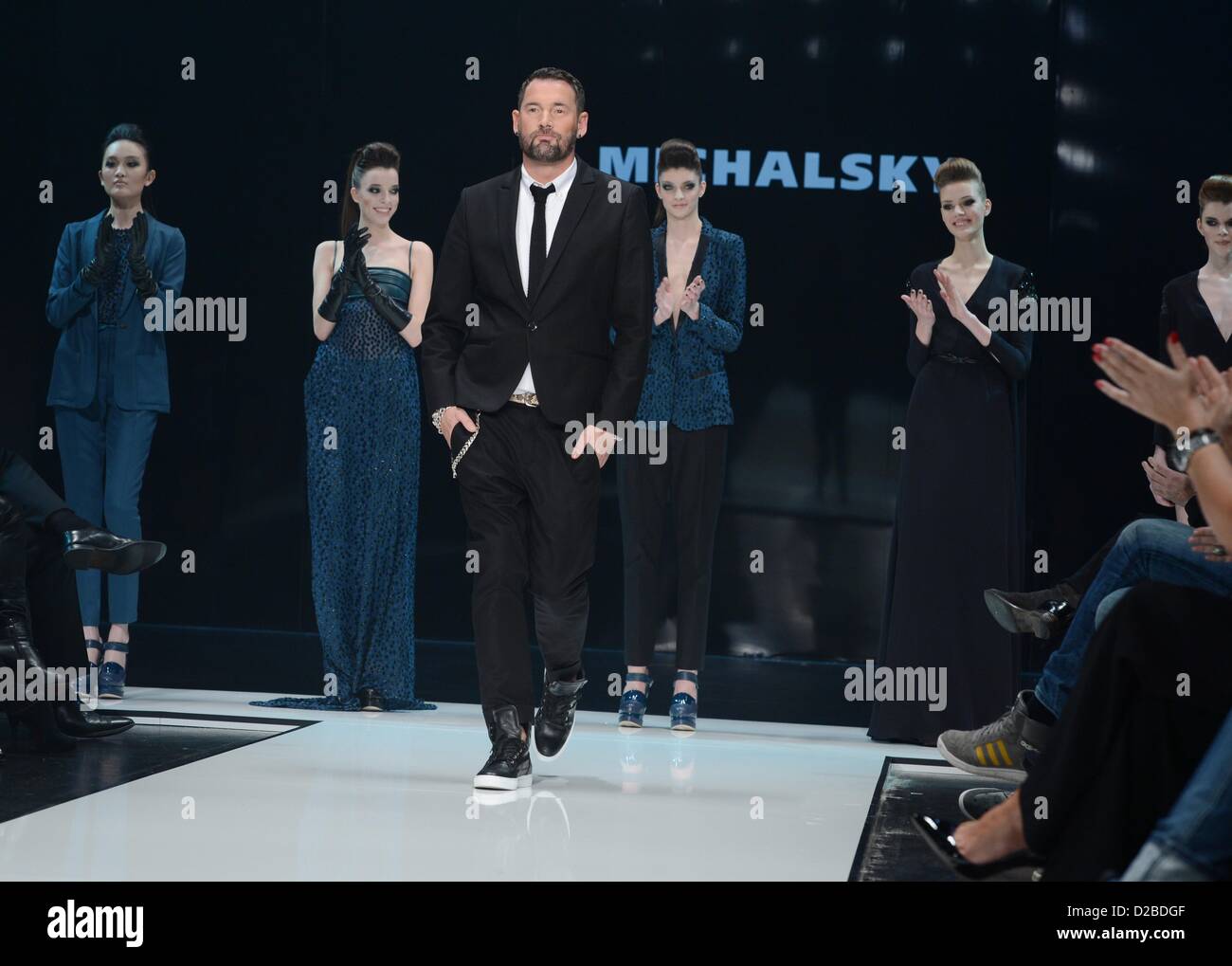 Fashion designer Michael Michalsky (C) walks the catwalk at the Michael ...