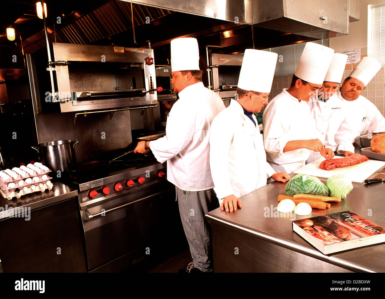 Chefs In A Kitchen Stock Photo - Alamy