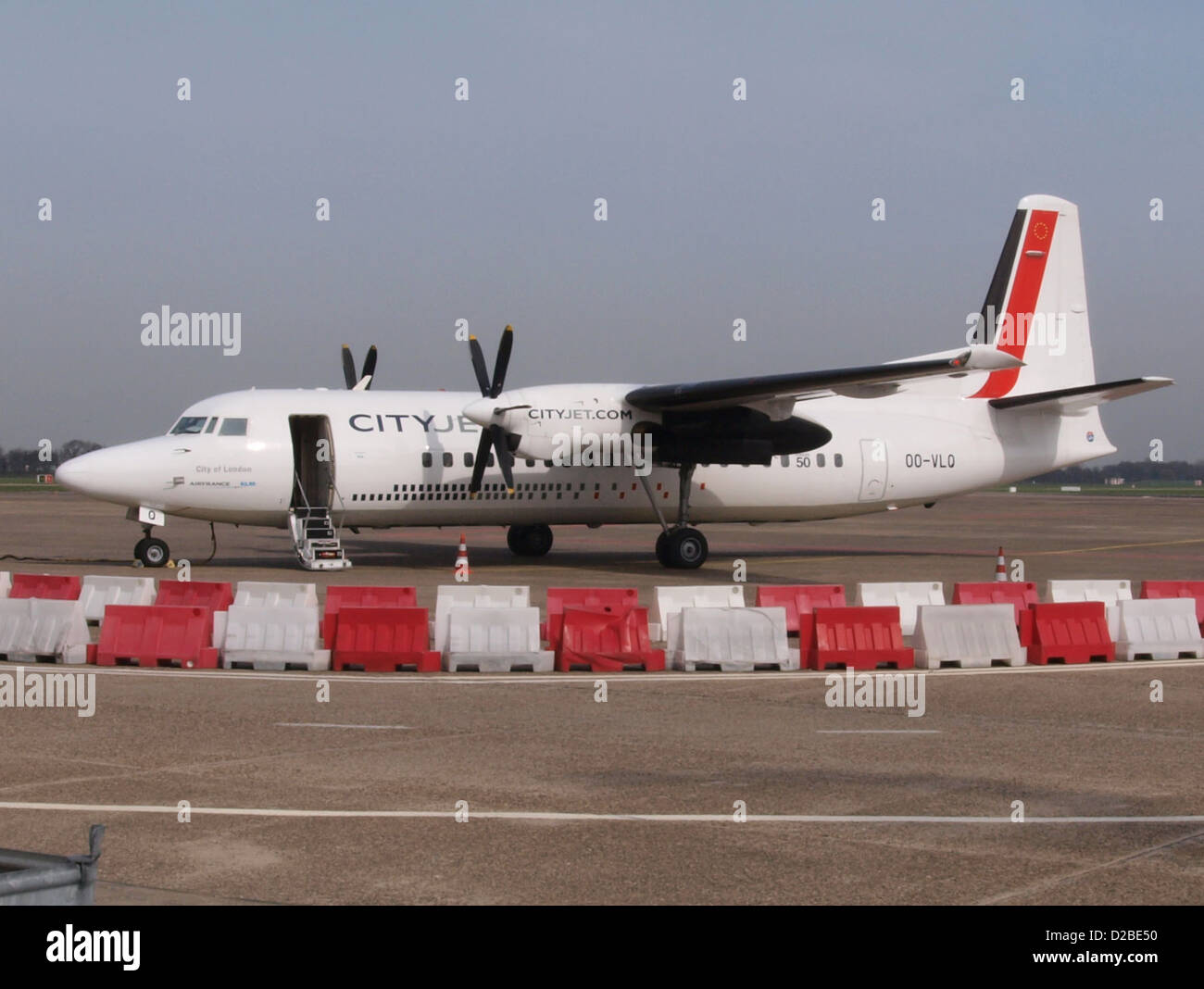 The Fokker 50, registered OO-VLO, is a turboprop aircraft operated by ...