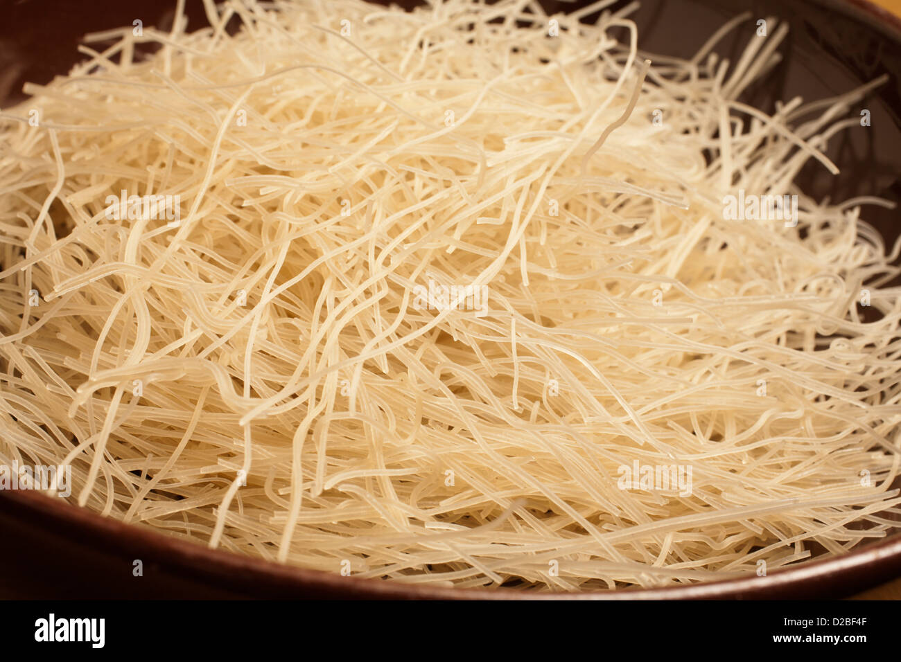 Sev: uncooked Indian rice noodles Stock Photo - Alamy
