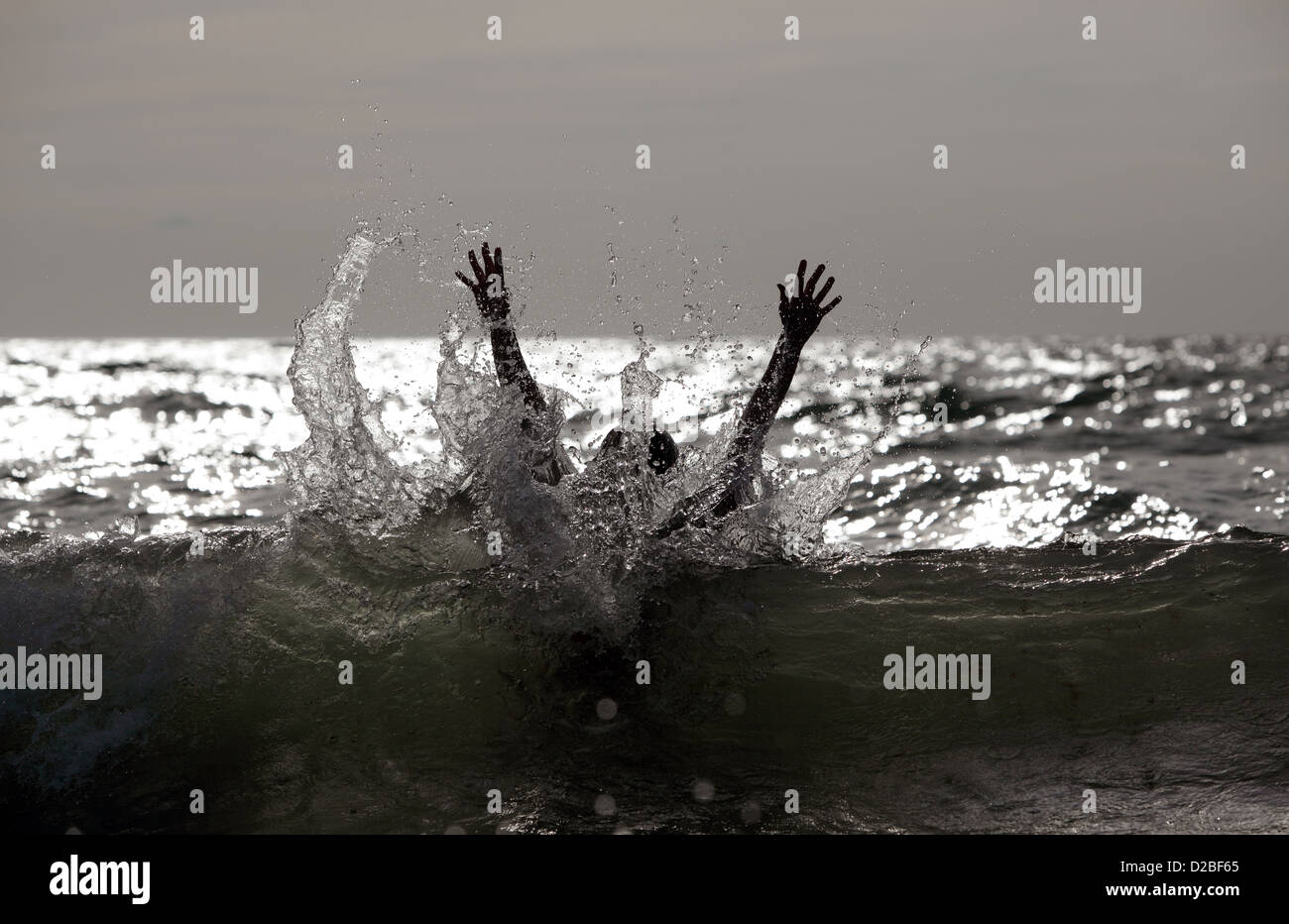 Drowning man silhouette hi-res stock photography and images - Alamy