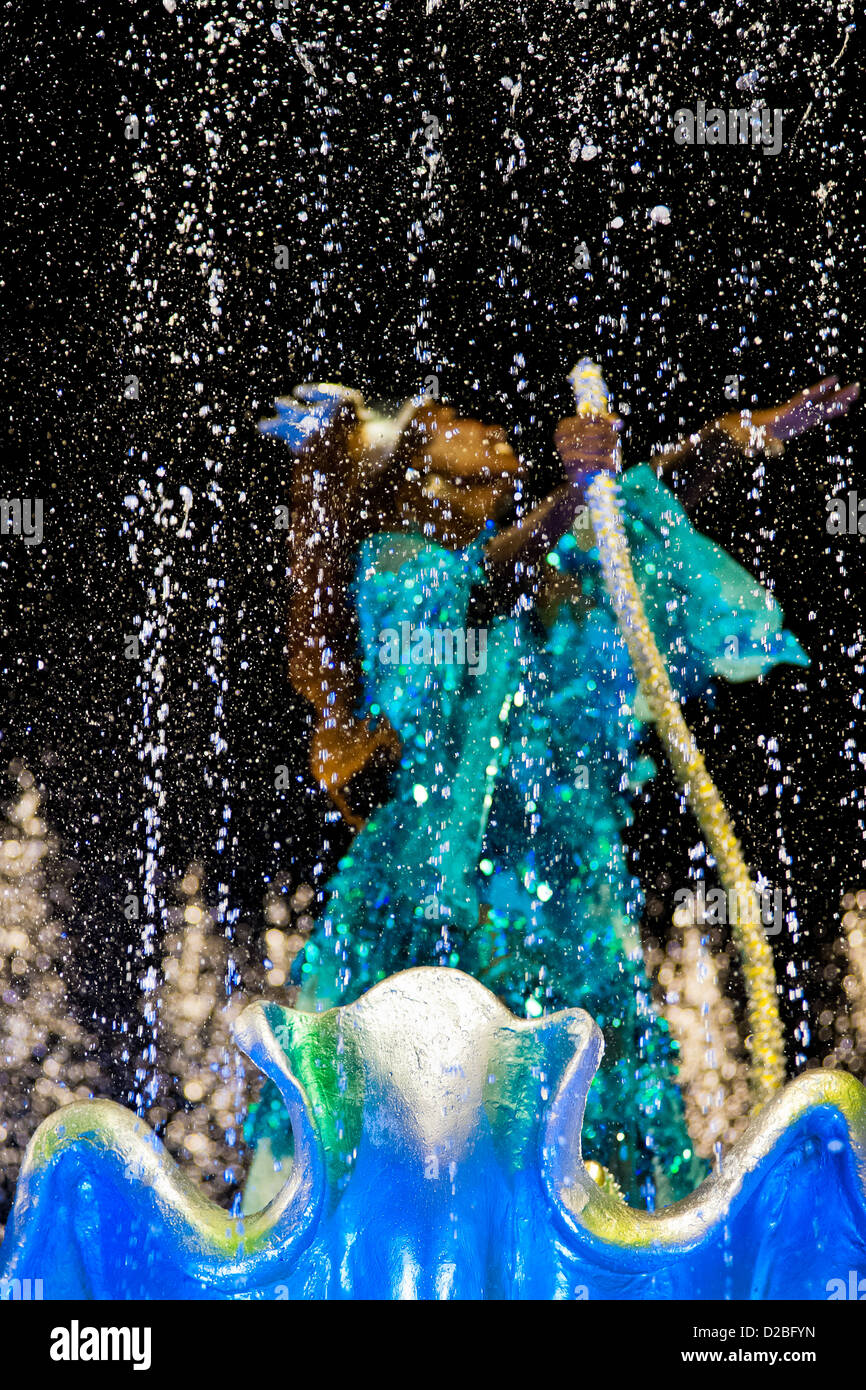 A dancer of Portela samba school performs atop a float during the ...