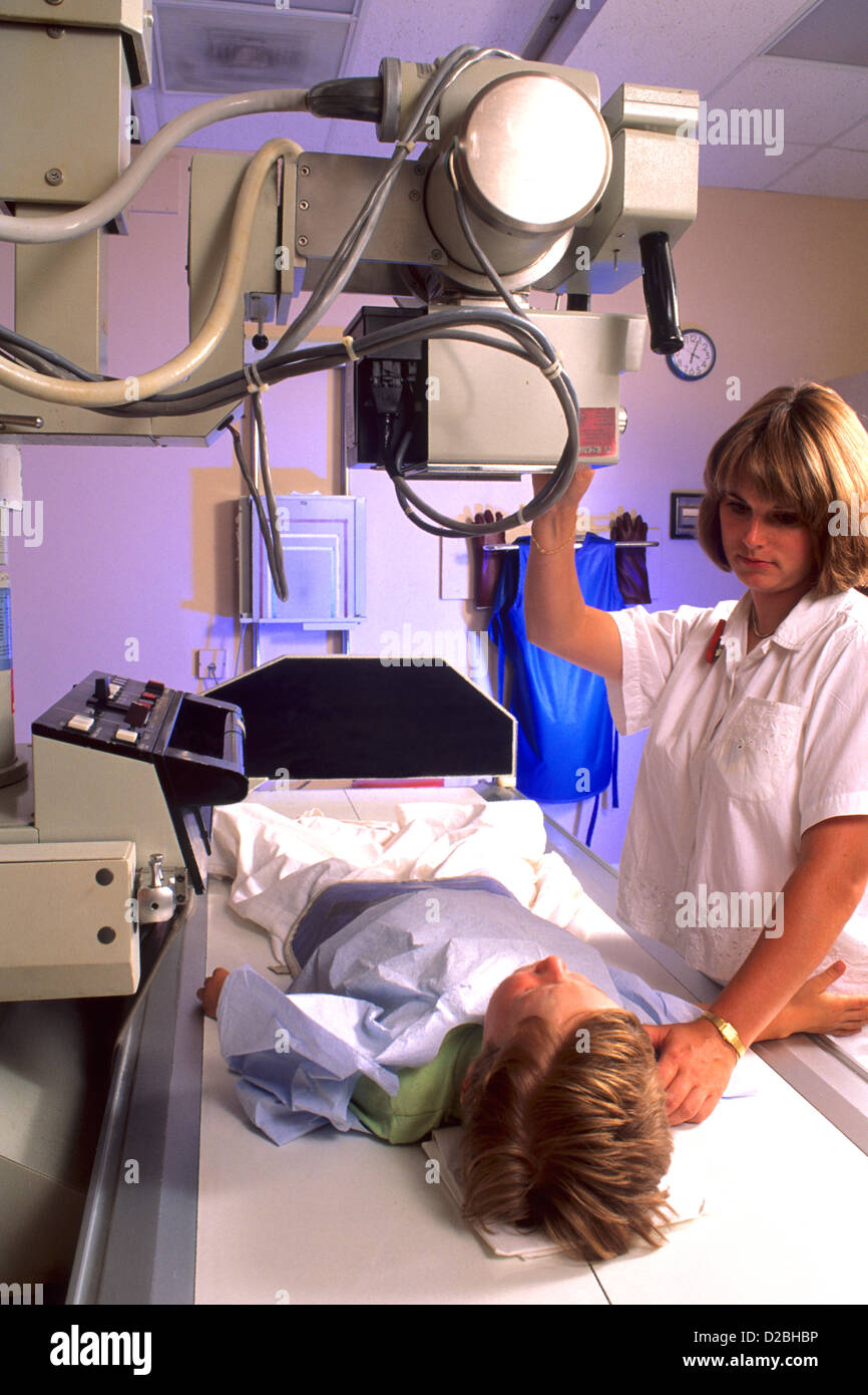 Lab Technician Performing X-Ray On A Child Stock Photo - Alamy