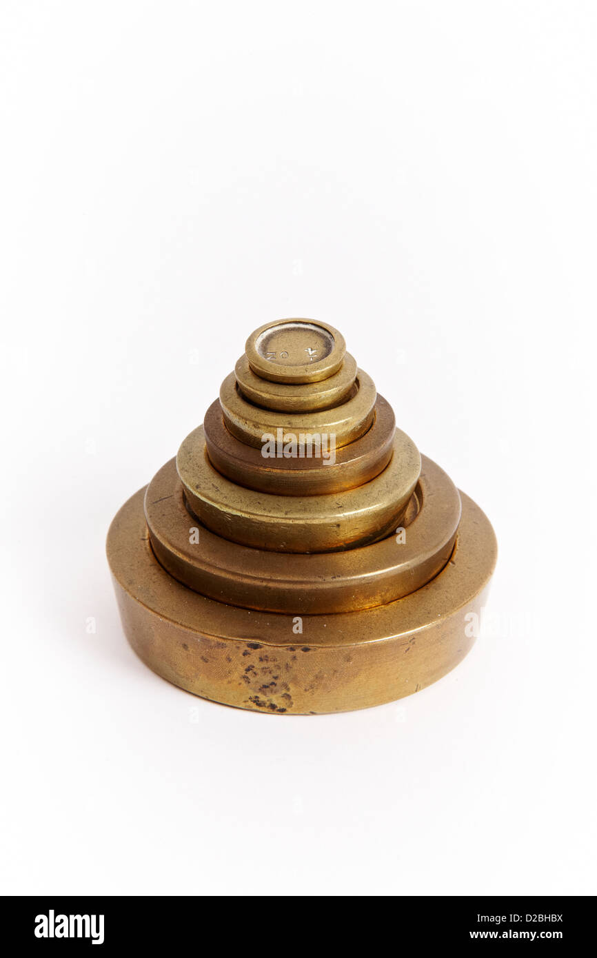 Complete set of English old style brass weights Stock Photo - Alamy