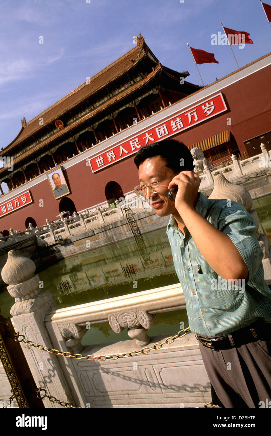 China, Beijing, Tiananmen Square, Heavenly Gate. Man On Cell Phone ...
