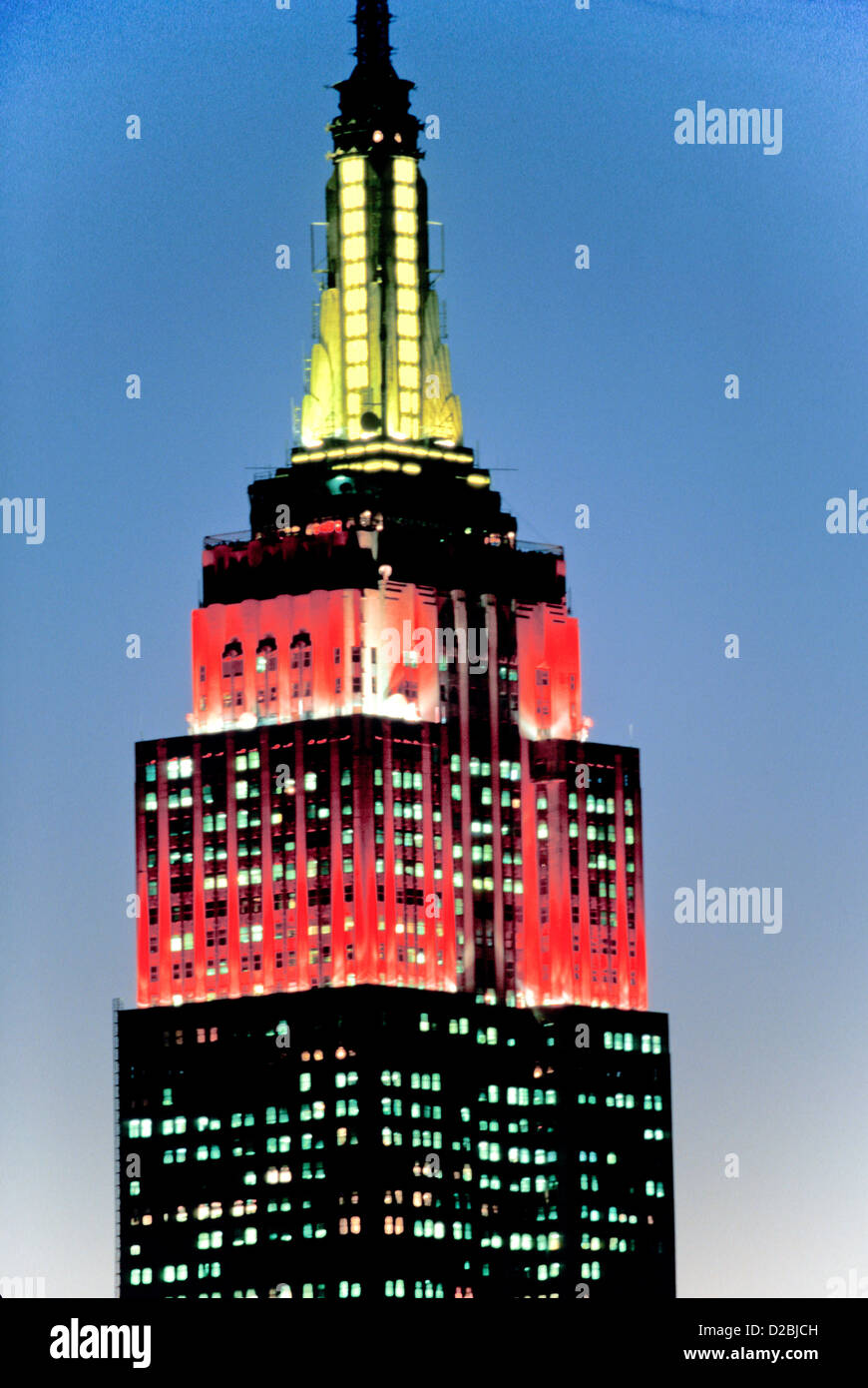 Empire State Building At Night, Red And Yellow Lights Stock Photo - Alamy