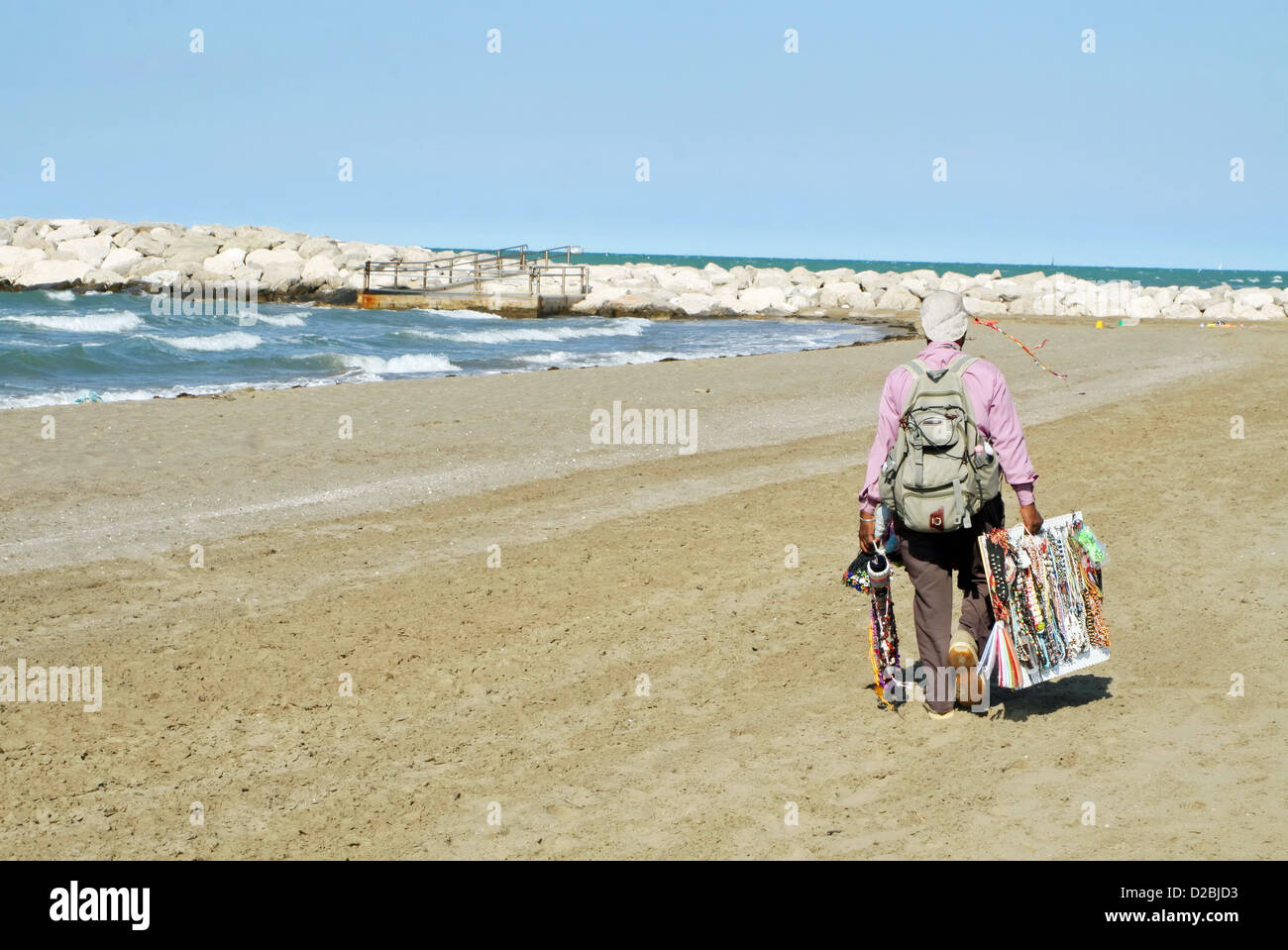 immigrant in the sand beach in summer Stock Photo - Alamy