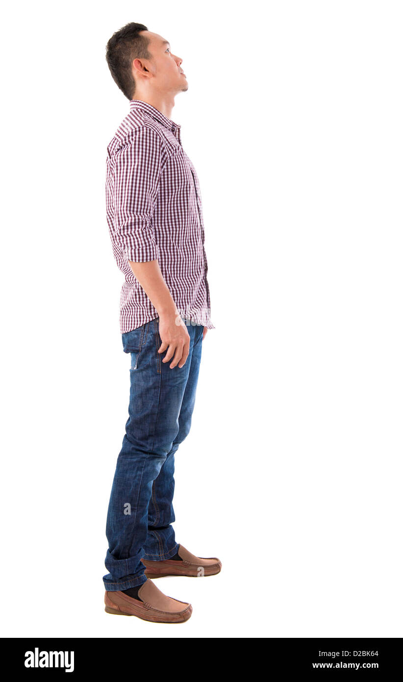 Side view full body Chinese Asian male standing looking up isolated on ...