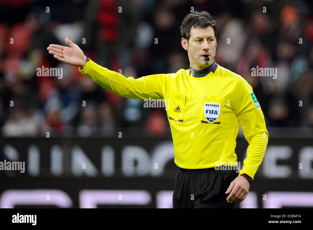 Referee Wolfgang Stark gestures during the German Bundesliga soccer ...