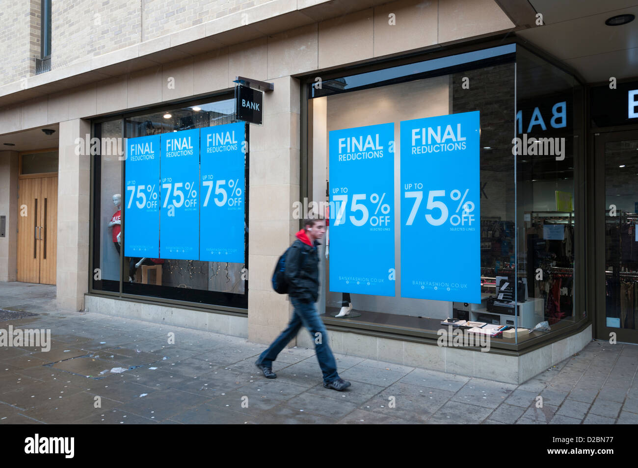 Bank clothes shop in Cambridge UK with sale signs and 75% off markers ...