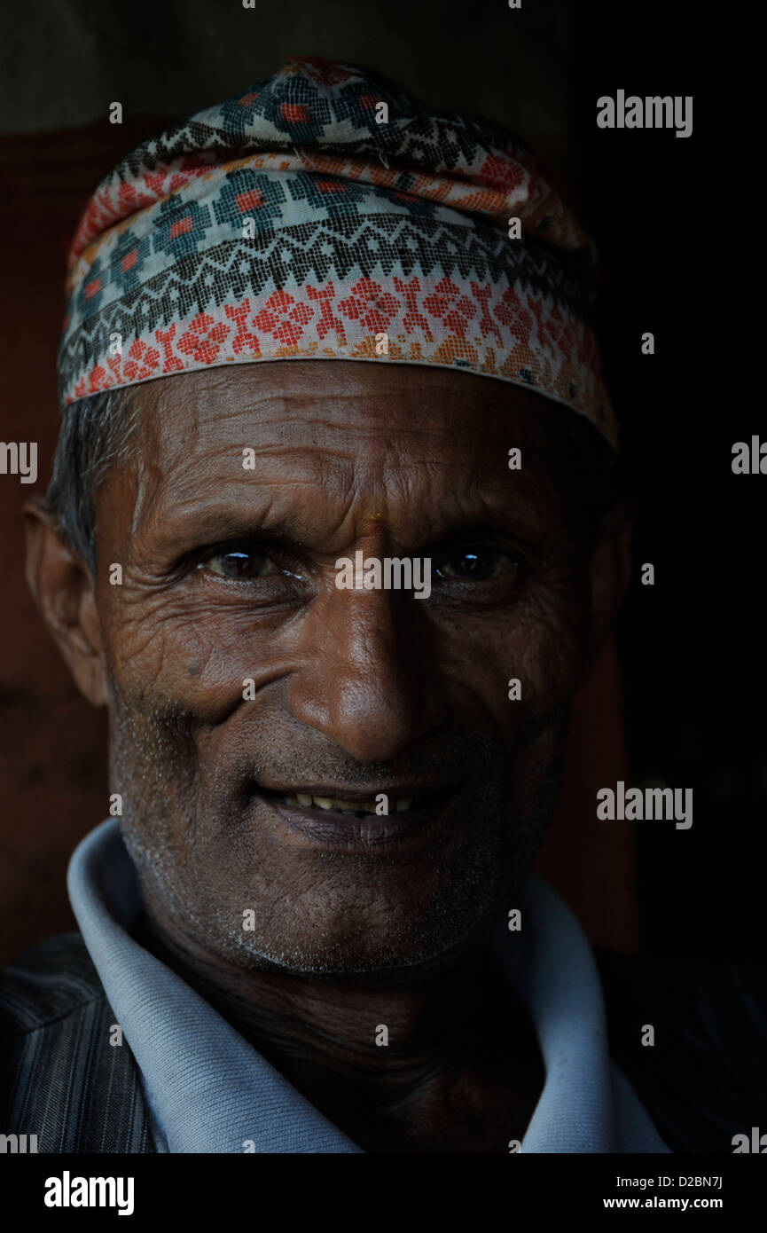 nepalese man in his traditional clothes with his hat Stock Photo - Alamy