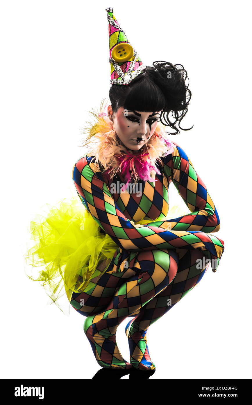 one woman harlequin circus dancer performer in silhouette studio ...