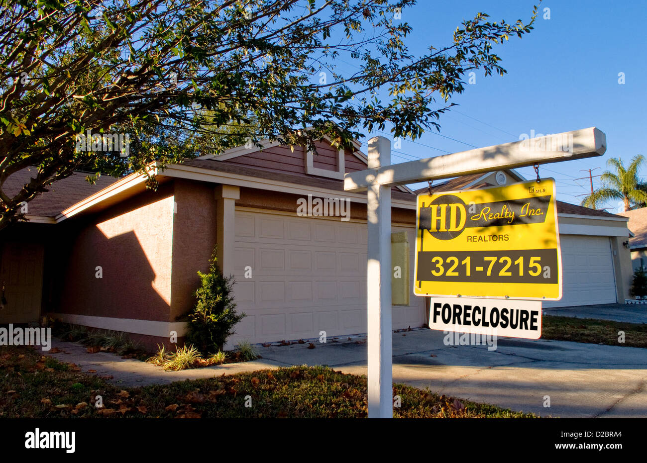 Home With Foreclosure Sign Stock Photo - Alamy
