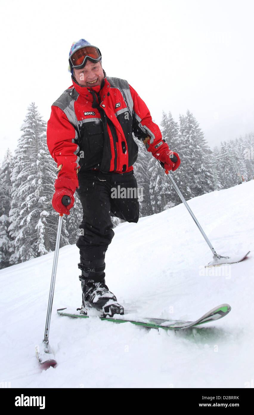Hobby skier Alfred Beyer stands on one ski during his skiing vacation ...