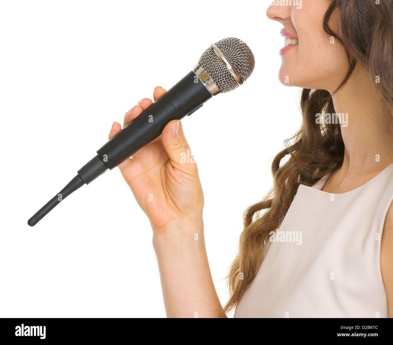 Closeup on young woman with microphone Stock Photo - Alamy
